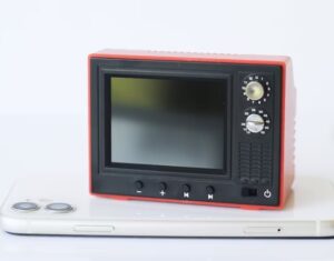 Scaling Down Reality: How Miniature Working TVs Elevate Dollhouse Design